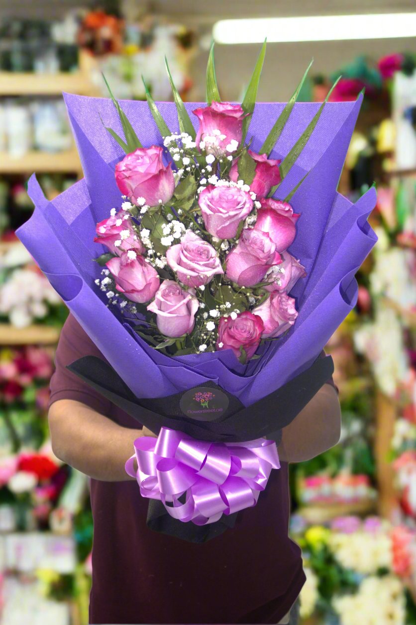 12 Purple Rose Bouquet with Baby’s Breath and Palm Leaves – Flower Street